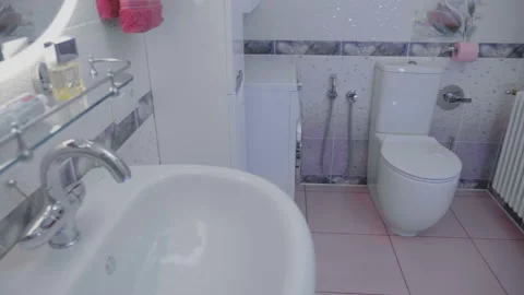 Bathroom interior: washing machine, radi... | Stock Video | Pond5