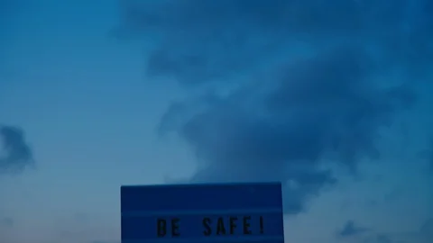 Be safe message or sign on isolated nigh... | Stock Video | Pond5