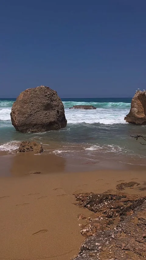 beach and rocks in island, sea, beach, c... | Stock Video | Pond5