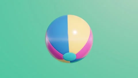 Beach ball rotates on a green background... | Stock Video | Pond5
