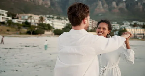 Beach, holding hands and interracial cou... | Stock Video | Pond5