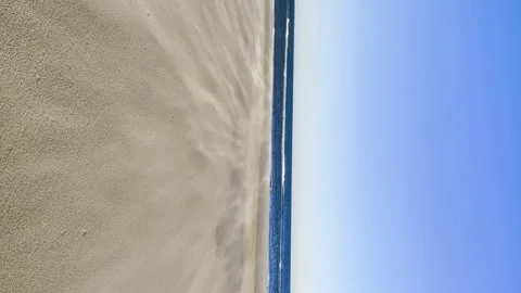 beach sand being blown up by the wind, s... | Stock Video | Pond5