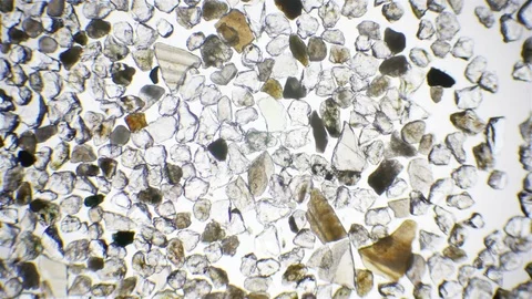 Beach sand particles under the microscop... | Stock Video | Pond5