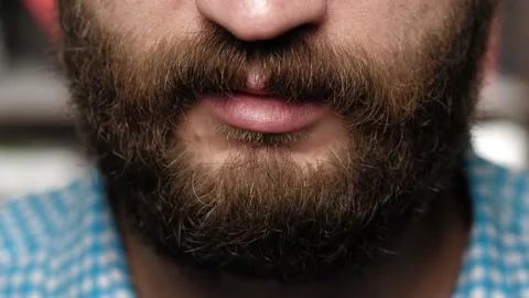 Bearded man is drinking vodka. Male hand... | Stock Video | Pond5