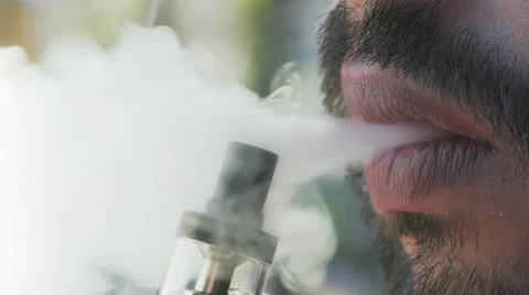 Man Vaping Stock Video Footage | Royalty Free Man Vaping Videos | Pond5