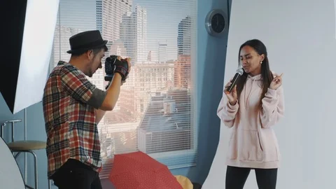 Beautiful african model singing to the m... | Stock Video | Pond5