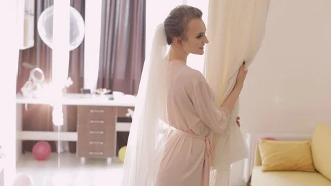 Beautiful and lovely bride in night gown... | Stock Video | Pond5