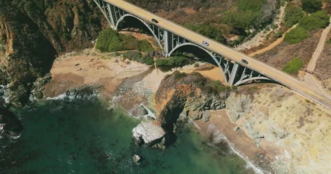 Beautiful arch bridge close to the sandy... | Stock Video | Pond5