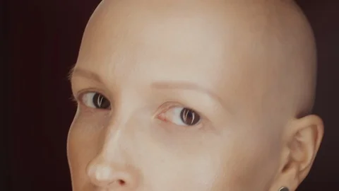 Beautiful Bald Woman without Makeup Posi... | Stock Video | Pond5