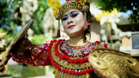 Beautiful Balinese female dancing with h... | Stock Video | Pond5