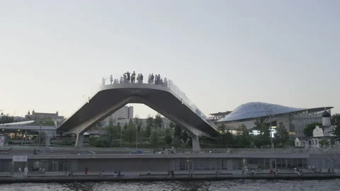 Beautiful bending bridge above river on ... | Stock Video | Pond5