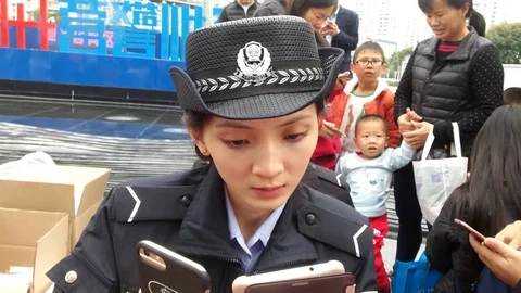 Beautiful Chinese female police | Stock Video | Pond5
