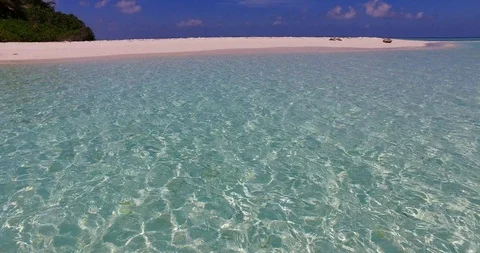 Beautiful crystal clear clean sea by whi... | Stock Video | Pond5