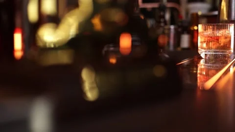 a beautiful drink whiskey ice bar counte... | Stock Video | Pond5