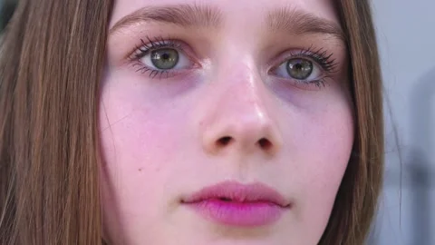 beautiful face of daydreaming girl looks... | Stock Video | Pond5