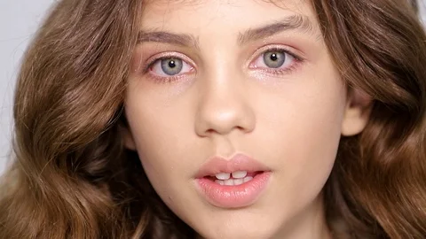 Beautiful face of little girl model on a... | Stock Video | Pond5