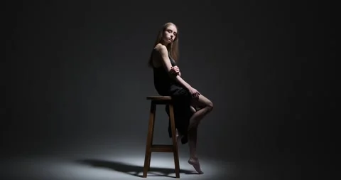 Beautiful fashion model leaning and posi... | Stock Video | Pond5