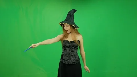 Beautiful funny witch casting spell and ... | Stock Video | Pond5