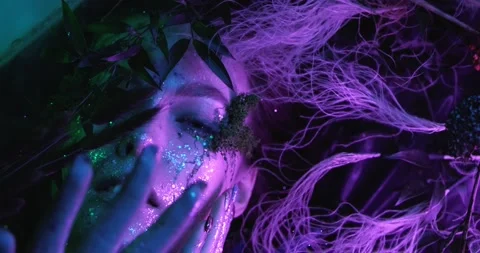 A beautiful ghost girl lies in a fog in ... | Stock Video | Pond5