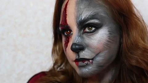 Beautiful girl with bleeding wound and r... | Stock Video | Pond5