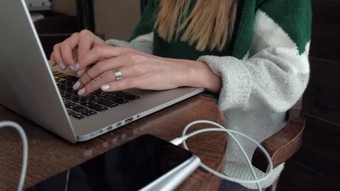 Beautiful girl model sitting at a table ... | Stock Video | Pond5