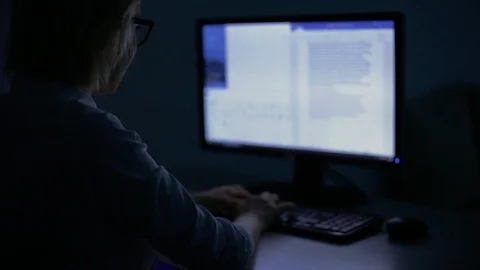 Beautiful girl, working late at night in... | Stock Video | Pond5