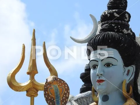 Photograph: Beautiful hindu god Lord Shiva Statue at the top of the ...
