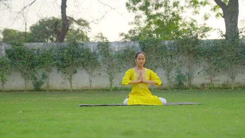 Beautiful Indian girl performing Namaska... | Stock Video | Pond5
