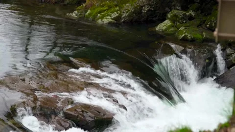 Beautiful laminar flow over a small rapi... | Stock Video | Pond5