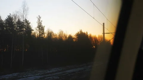 Beautiful lens flare view of sun setting... | Stock Video | Pond5