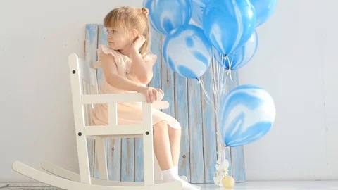 Beautiful little girl swinging in a rock... | Stock Video | Pond5