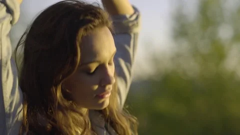 Beautiful Model Poses At Sunset In Park | Stock Video | Pond5