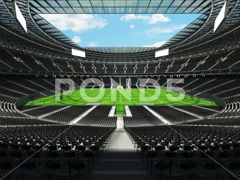 Beautiful modern rugby stadium with black seats, roof and VIP boxes ...