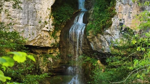 A beautiful multi-level waterfall. Its u... | Stock Video | Pond5