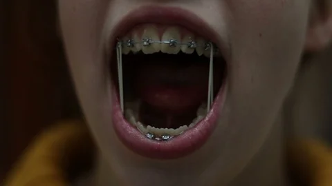 Beautiful Natural Teenage Girl Biting Te... | Stock Video | Pond5