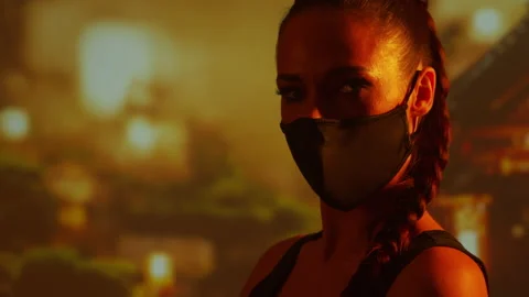 Beautiful ninja girl in a mask and with ... | Stock Video | Pond5