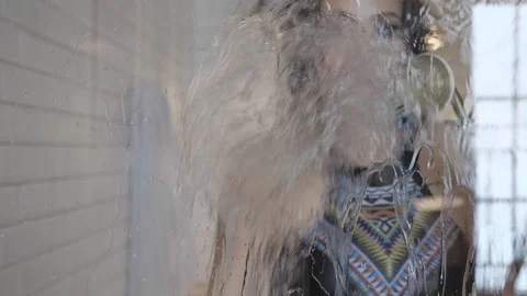 Beautiful Russian girl in the shower | Stock Video | Pond5