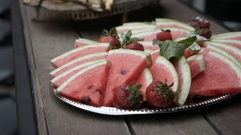 Beautiful slices of watermelon on the bu... | Stock Video | Pond5