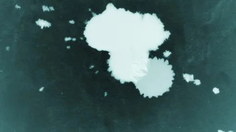 Beautiful Spreading Ink Drops on Wet Smo... | Stock Video | Pond5