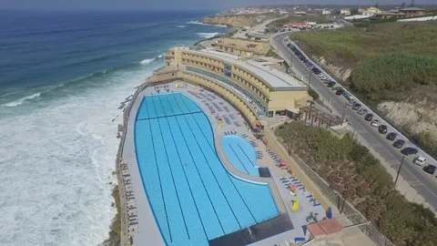 Beautiful swimming pool over the ocean. ... | Stock Video | Pond5
