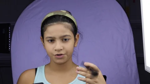 Beautiful Teenage Girl Vlogger Filming A... | Stock Video | Pond5