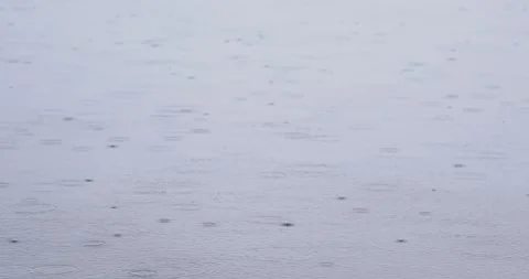 Beautiful view of rain falling on a sea ... | Stock Video | Pond5