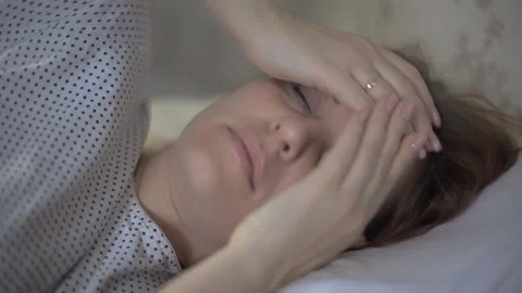 beautiful woman opens her eyes after sle... | Stock Video | Pond5