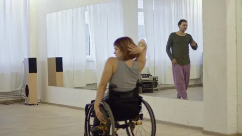 Beautiful Woman with Paralyzed Legs Danc... | Stock Video | Pond5