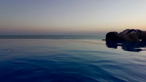 Beautiful woman relax in infinity swimmi... | Stock Video | Pond5
