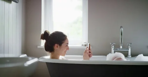 Beautiful Woman relaxing in bubble bath ... | Stock Video | Pond5