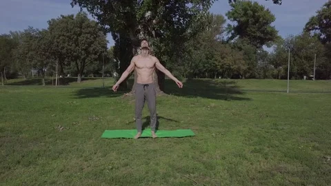 Beautiful yogi man is doing yoga exercis... | Stock Video | Pond5