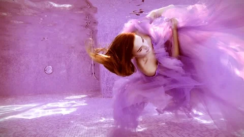 A beautiful young girl with long hair po... | Stock Video | Pond5