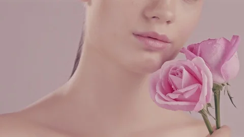 Beautiful young model with roses beauty ... | Stock Video | Pond5