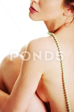 Beautiful young naked woman Beautiful young naked woman isolated on white ... Stock Photo #256353845